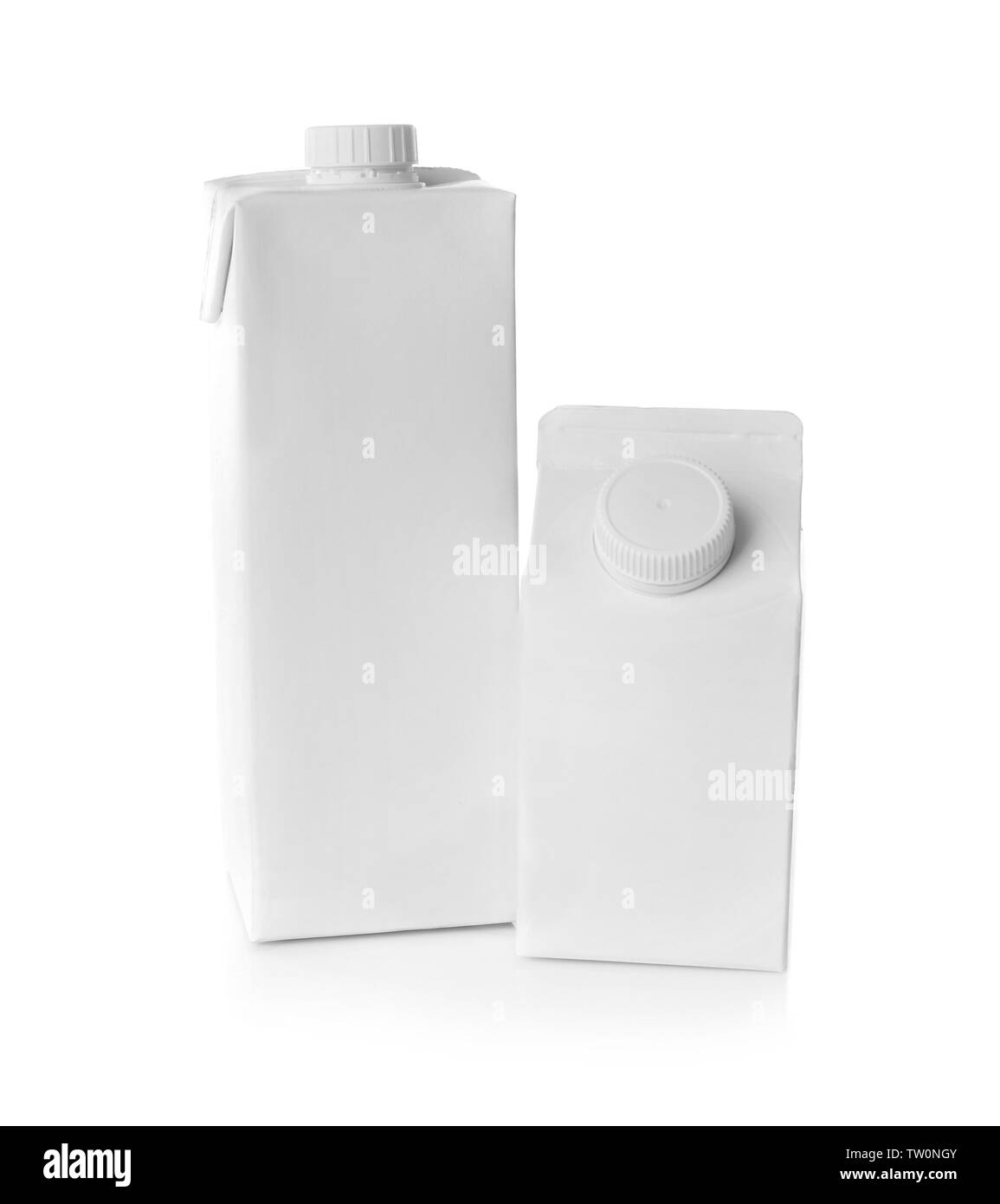 Two simple milk boxes on white background Stock Photo - Alamy