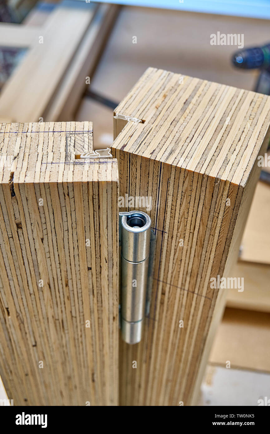 Wood door manufacturing process. Door hinge installation. Woodworking ...