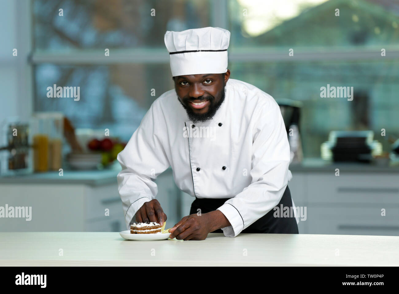 African man chef cake hi-res stock photography and images - Alamy