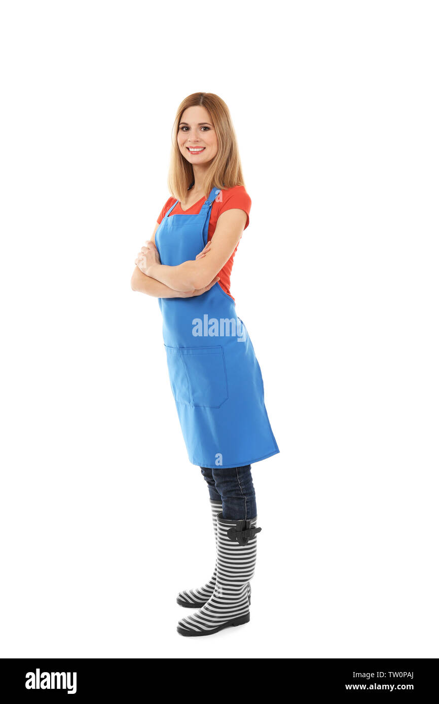 Beautiful woman in blue apron isolated on white background Stock Photo ...