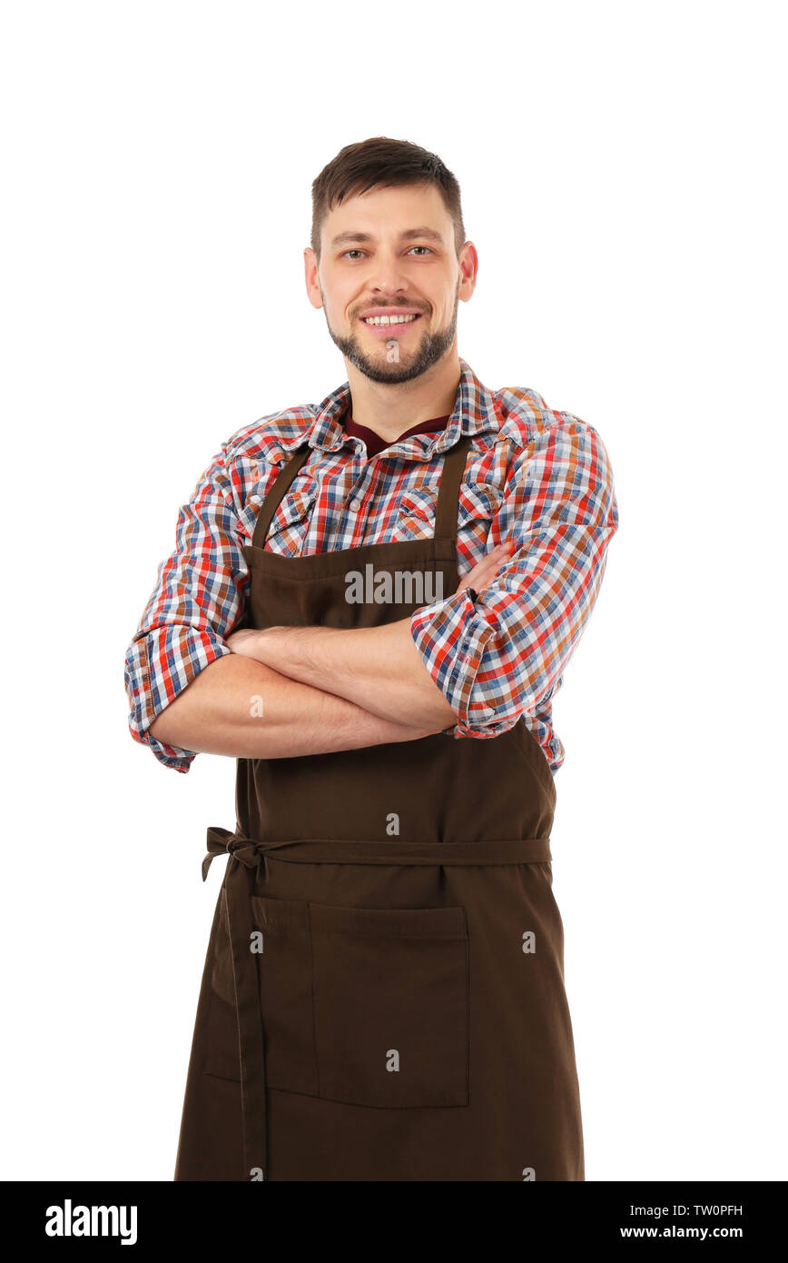 Handsome man in apron isolated on white background Stock Photo - Alamy