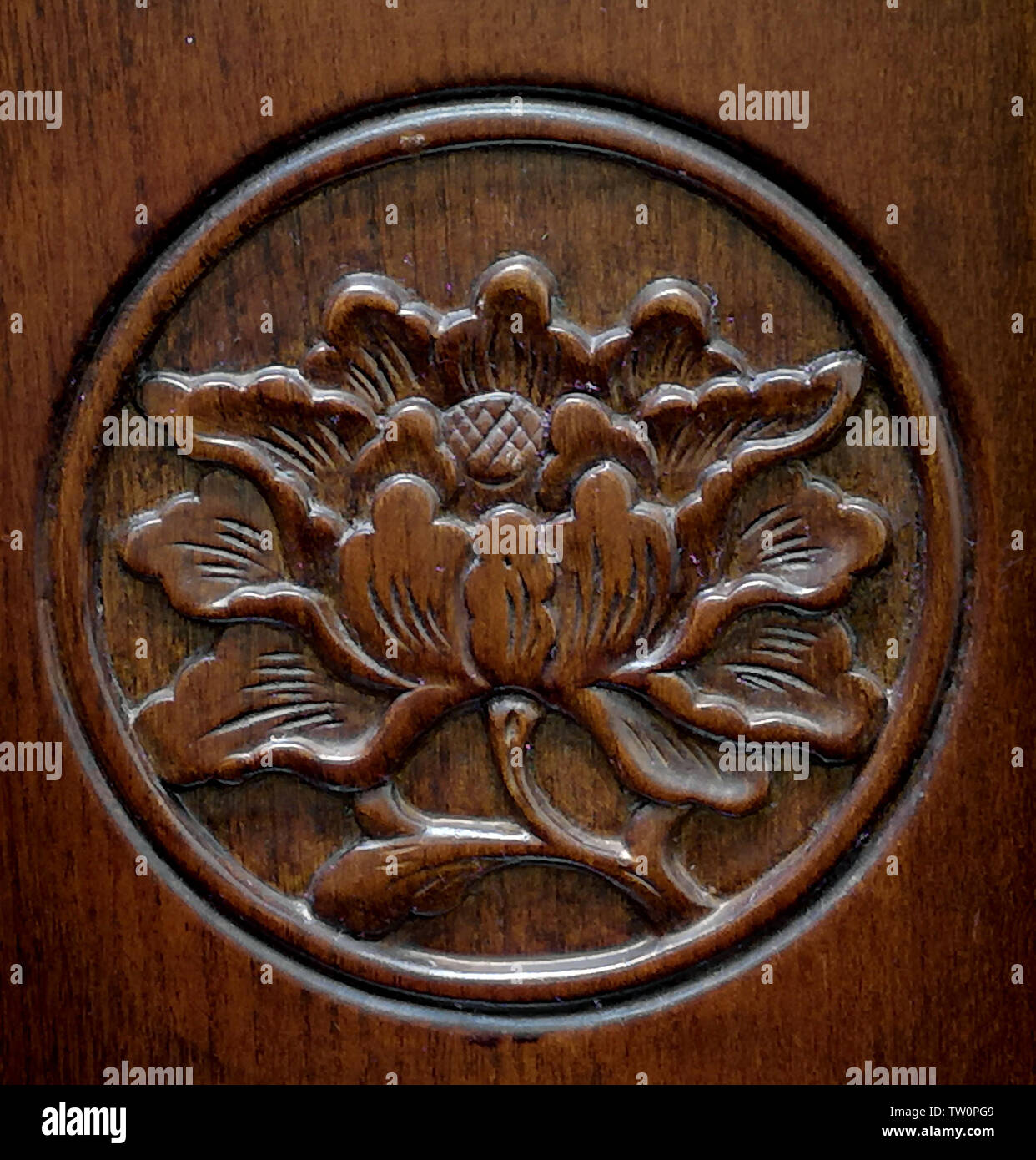 Carved pattern on Chinese solid wood antique furniture Stock Photo - Alamy