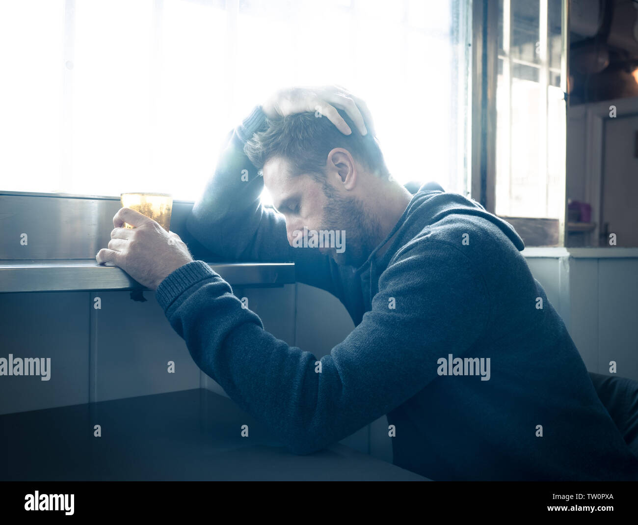 Unhappy man in pub portrait hi-res stock photography and images - Alamy