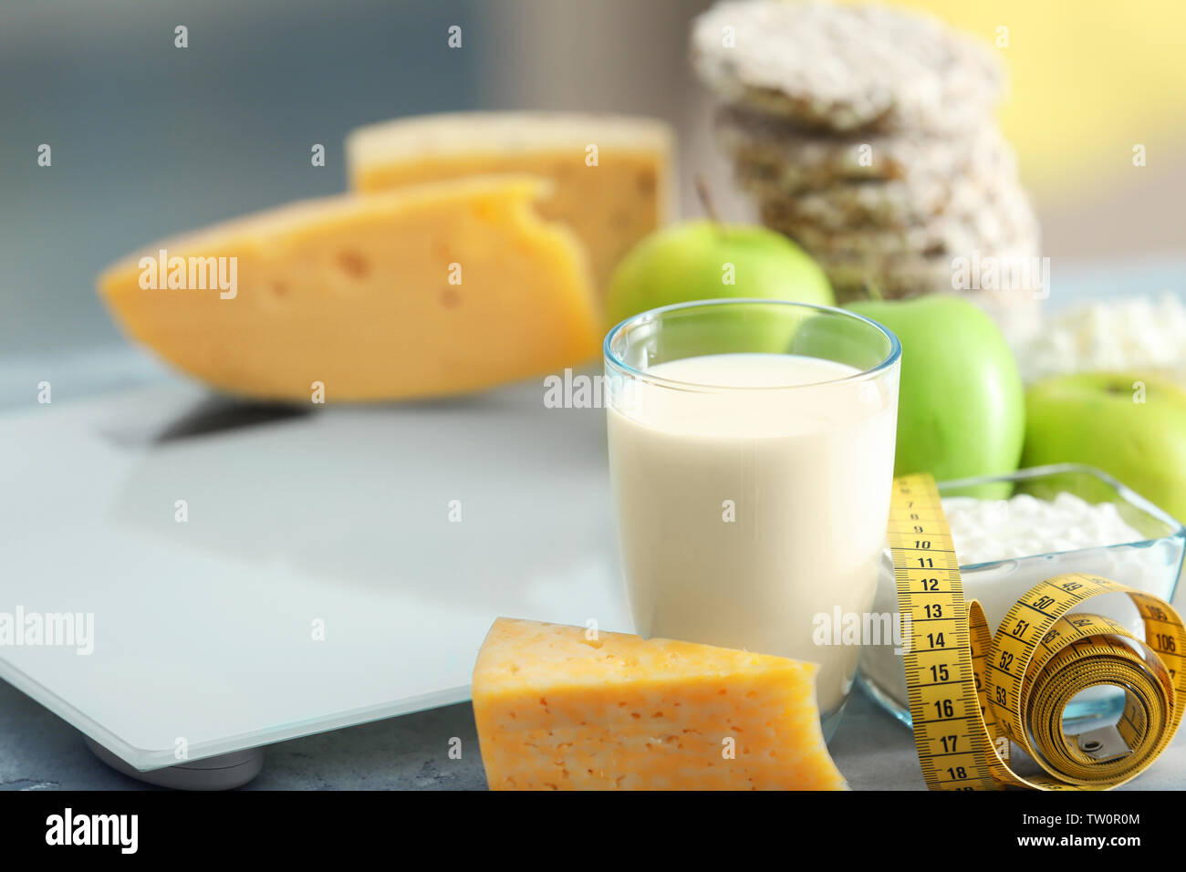 Glass milk on scales hi-res stock photography and images - Alamy