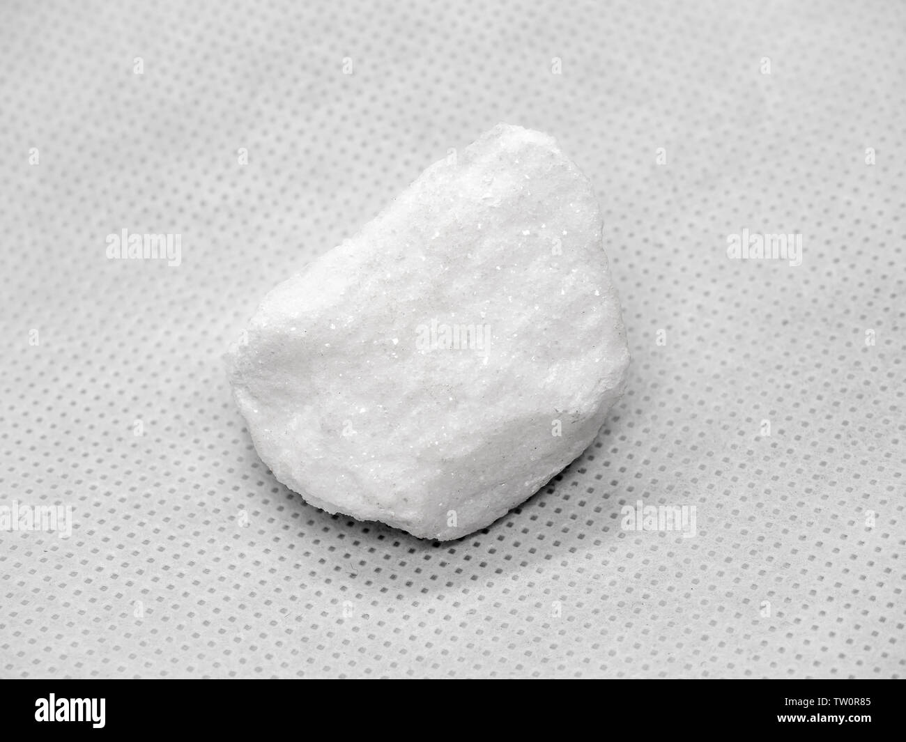 Geological specimen of natural white layered mineral Calcite ...