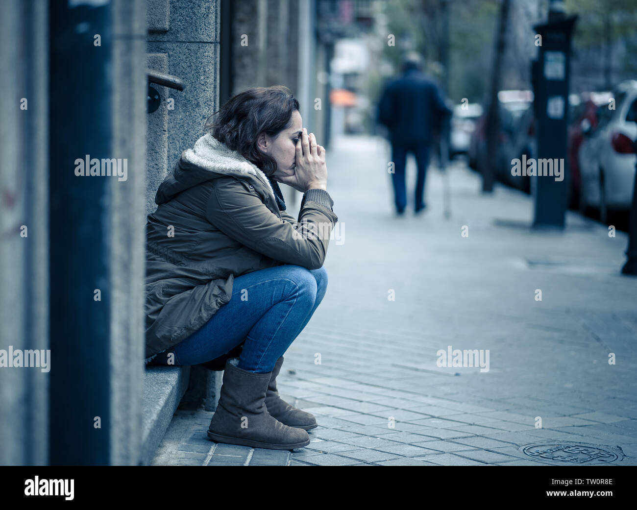 Attractive woman suffering from depression felling sad unhappy ...