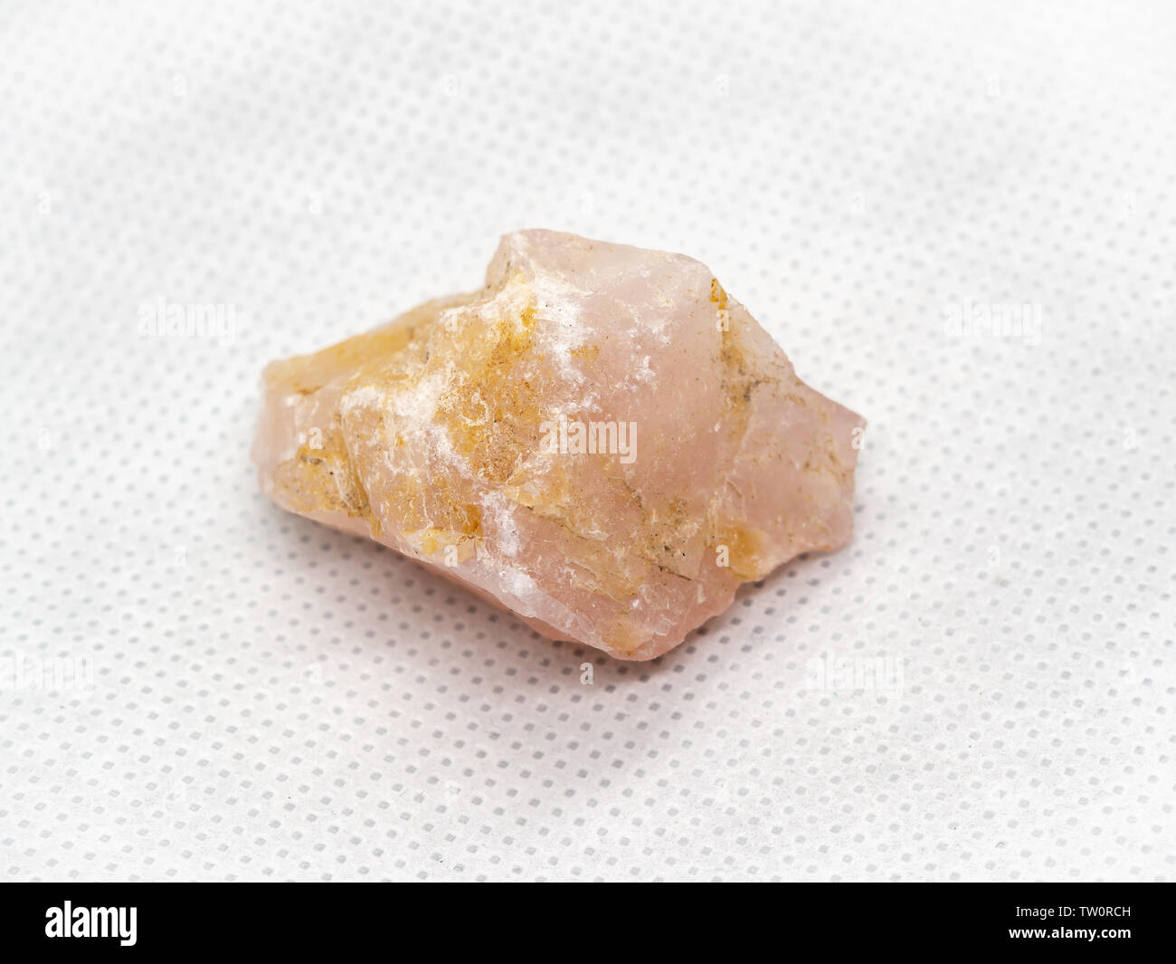 Geological specimen of natural pink layered mineral Rose quartz ...