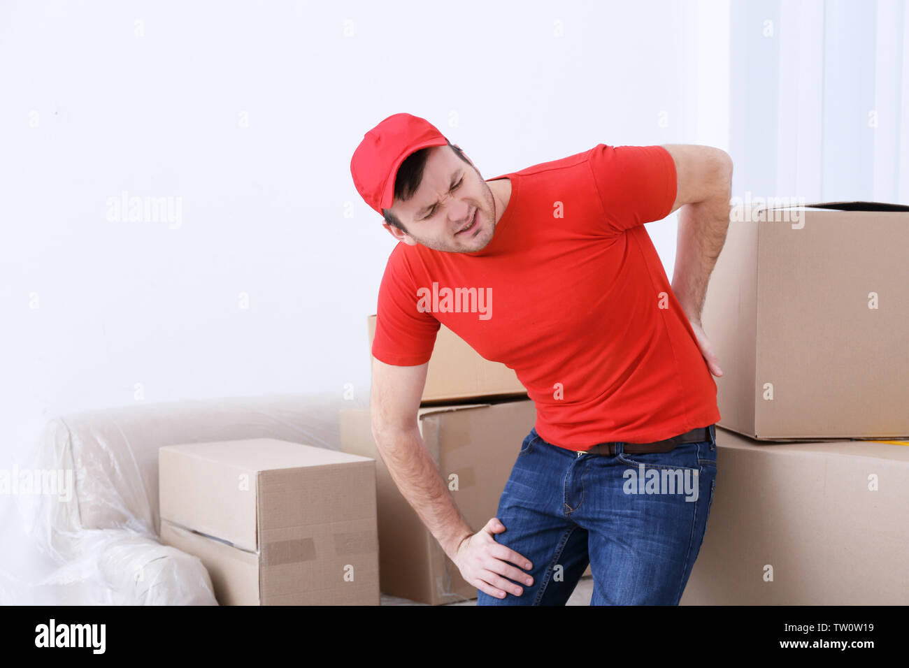 Moving heavy box hi-res stock photography and images - Alamy