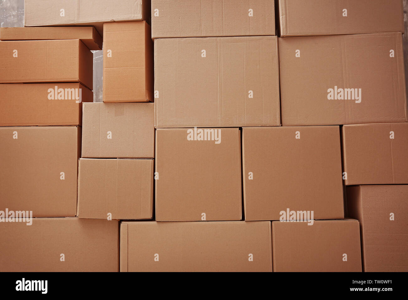 Cardboard boxes as background Stock Photo - Alamy