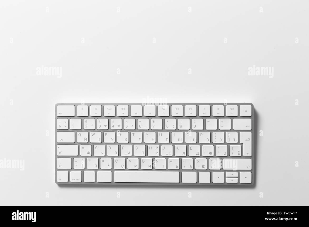 Office table with keyboard Isolated on white background Stock Photo - Alamy