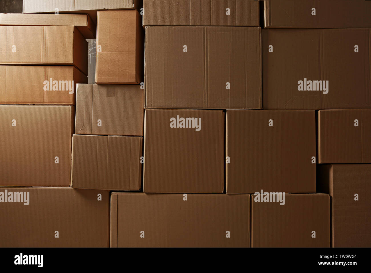 Cardboard boxes as background Stock Photo - Alamy