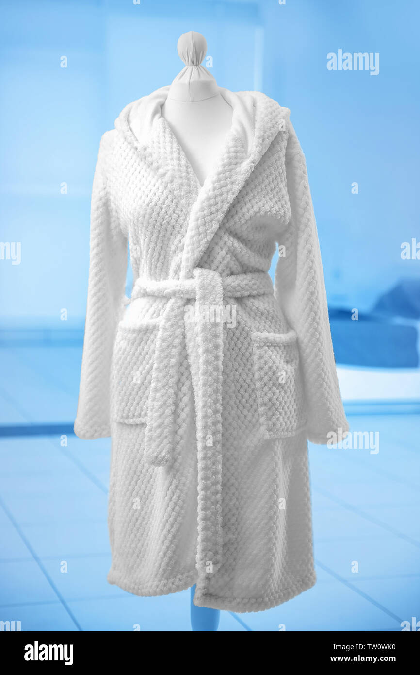 Bathrobe on dummy in room Stock Photo - Alamy