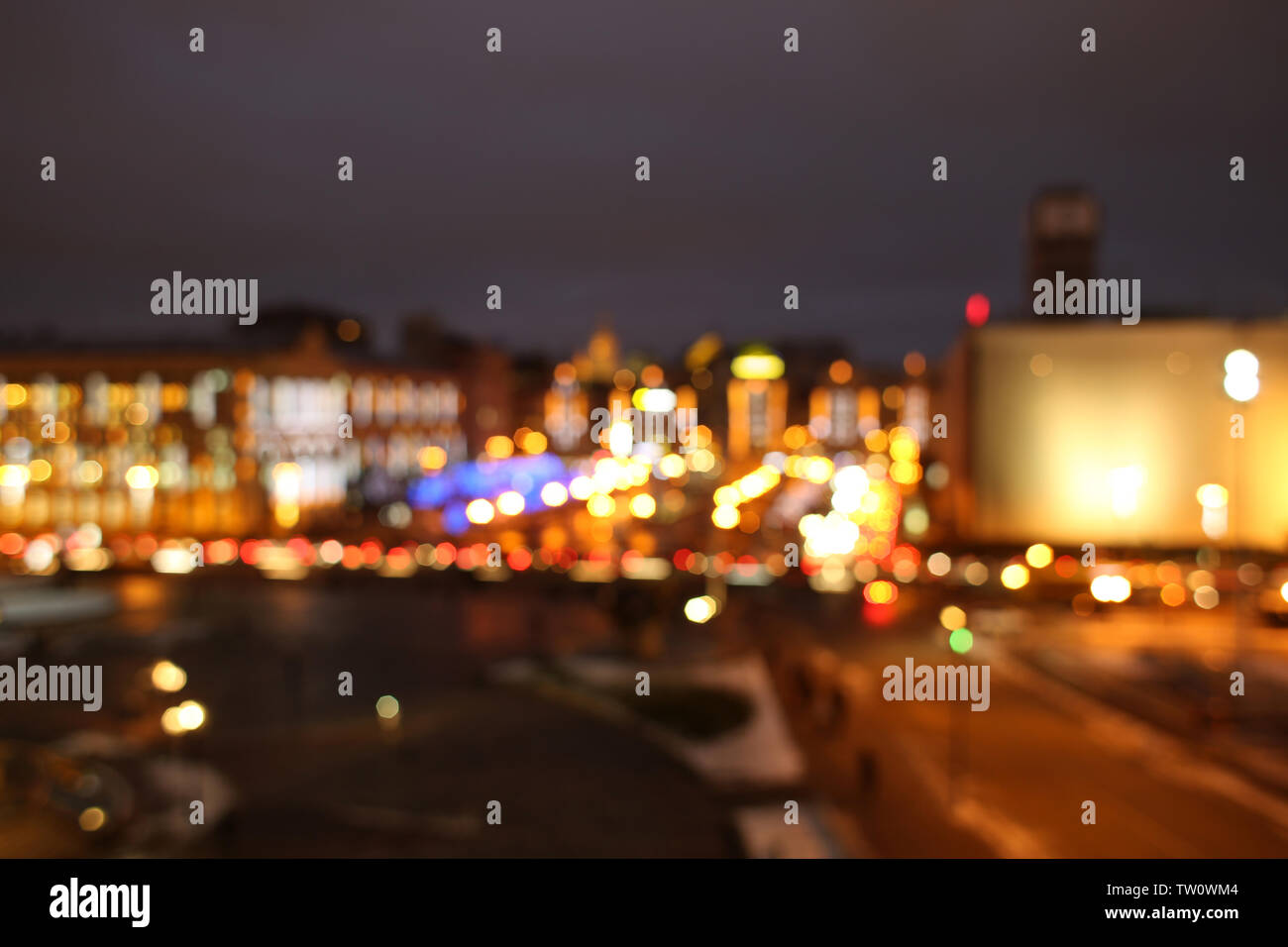 Blurred view of colorful night city lights Stock Photo - Alamy