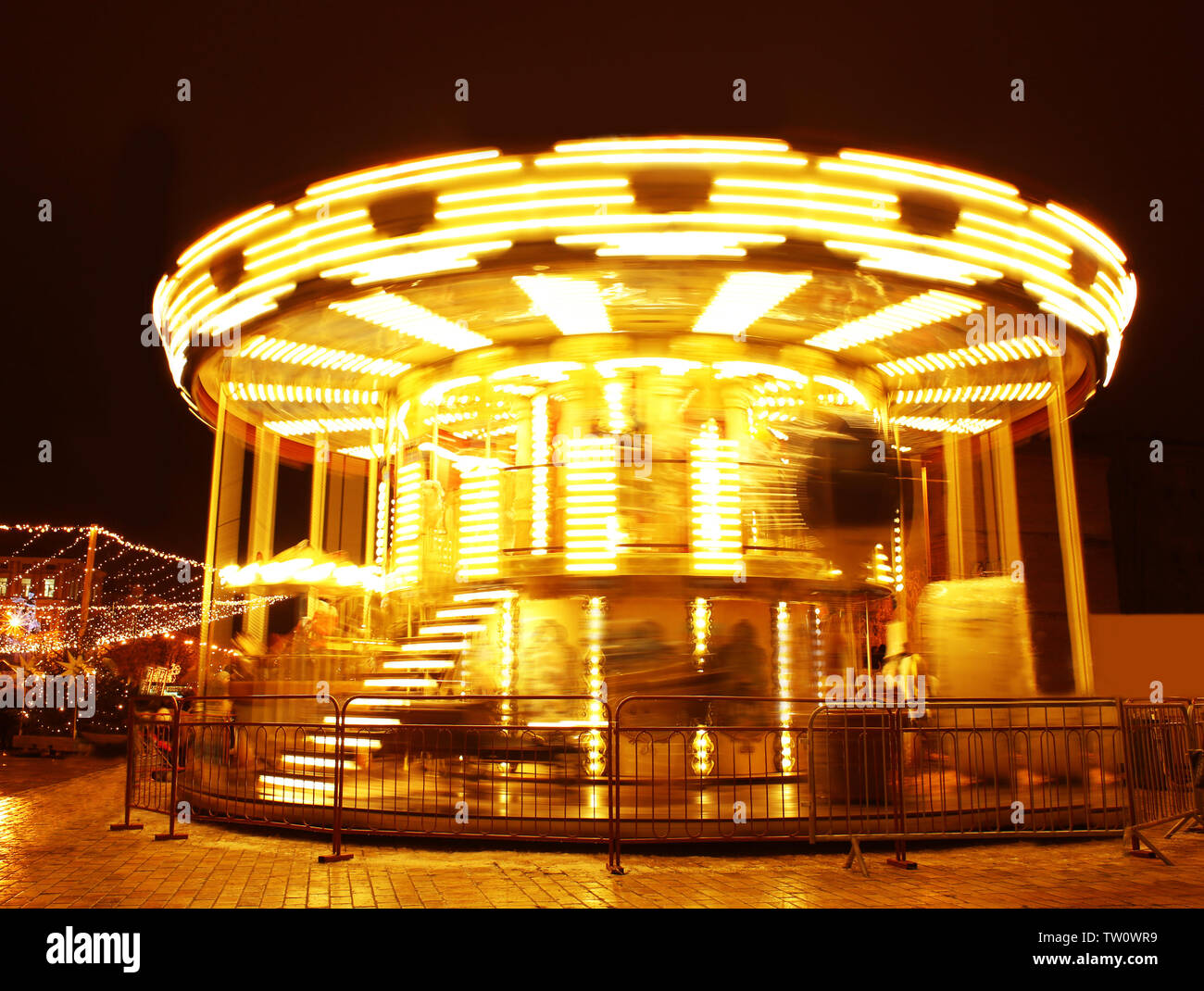Beautiful shiny carousel people night hi-res stock photography and ...