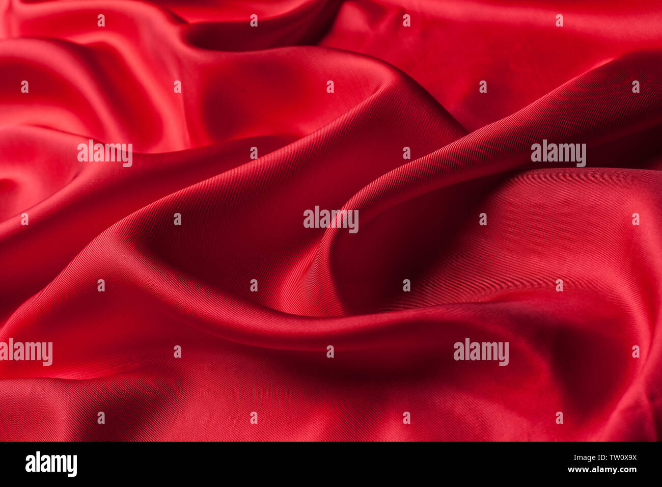 Red cloth waves background texture Stock Photo - Alamy
