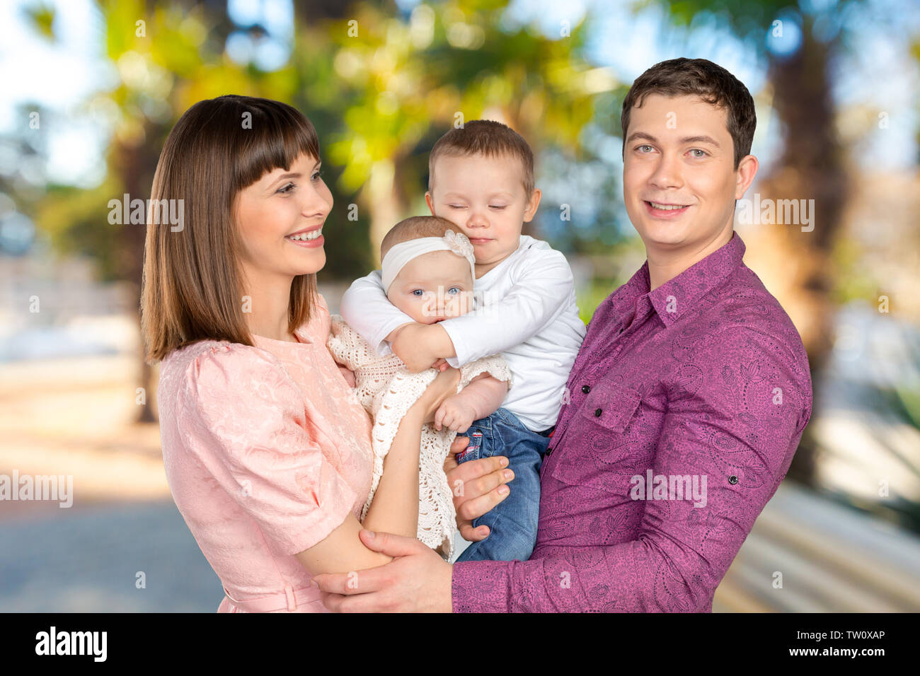 Beautiful happy family Stock Photo - Alamy