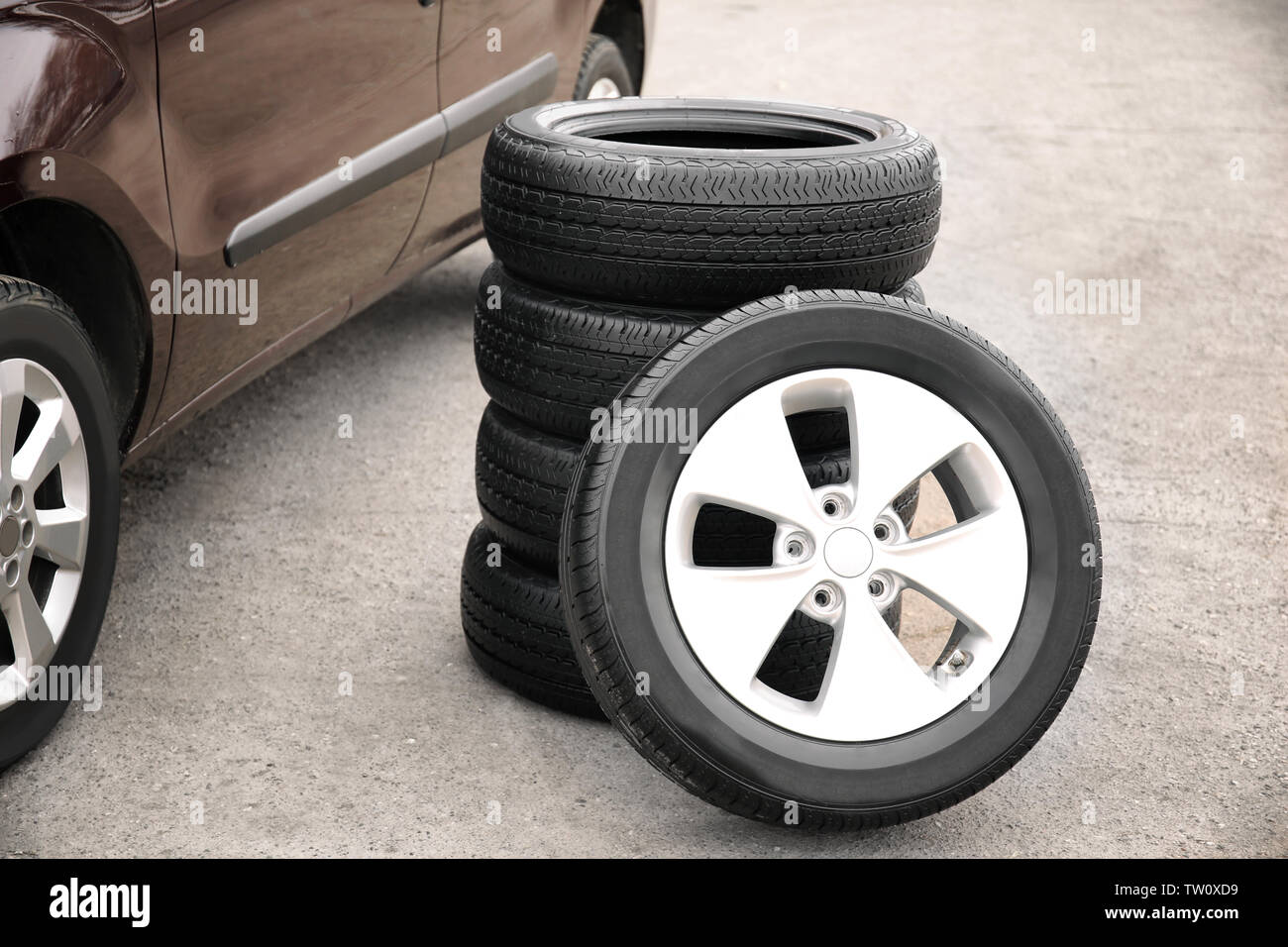 Stack of car tires outdoors Stock Photo - Alamy