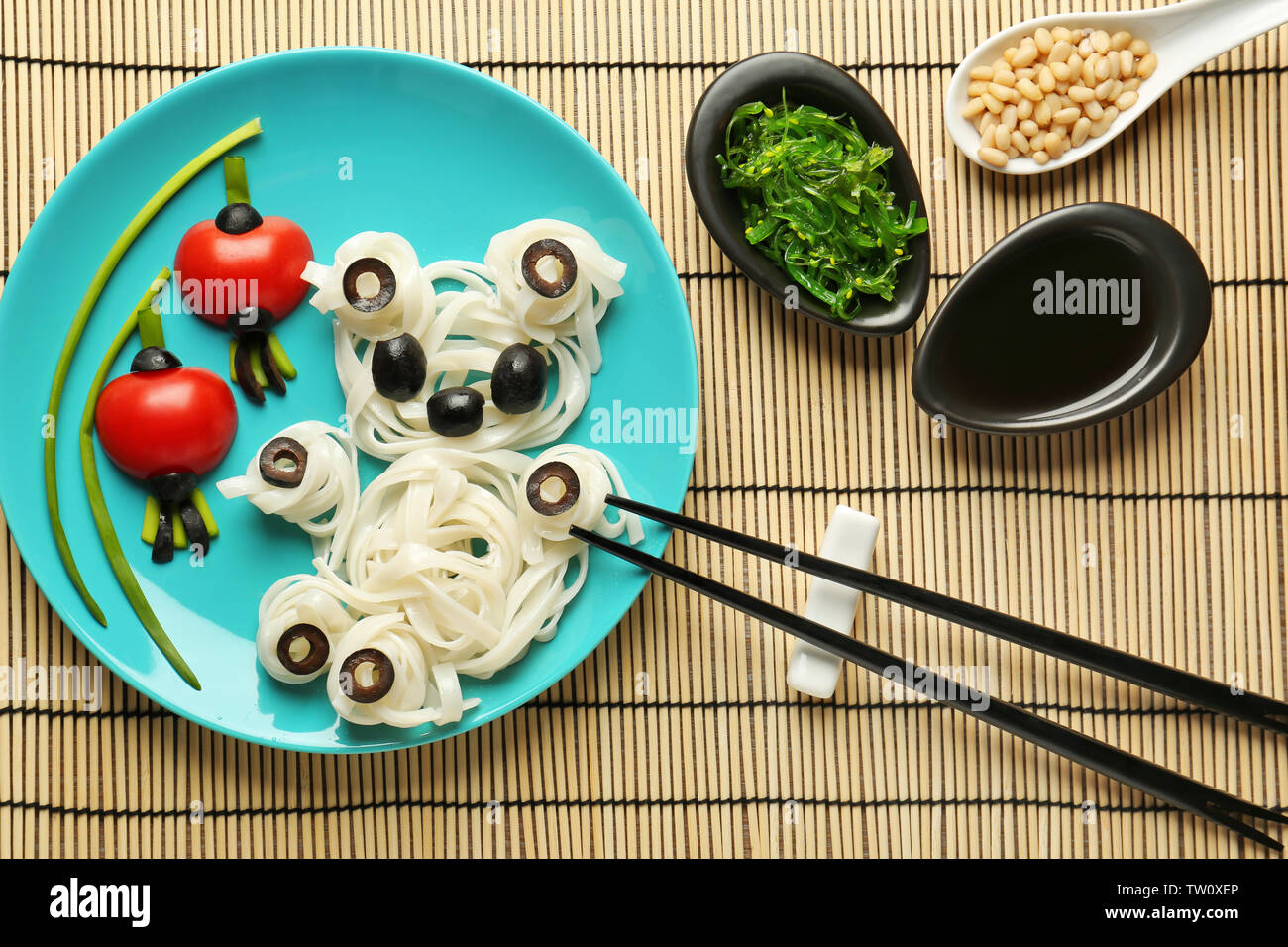 Plate with creative pasta for children on bamboo mat Stock Photo - Alamy