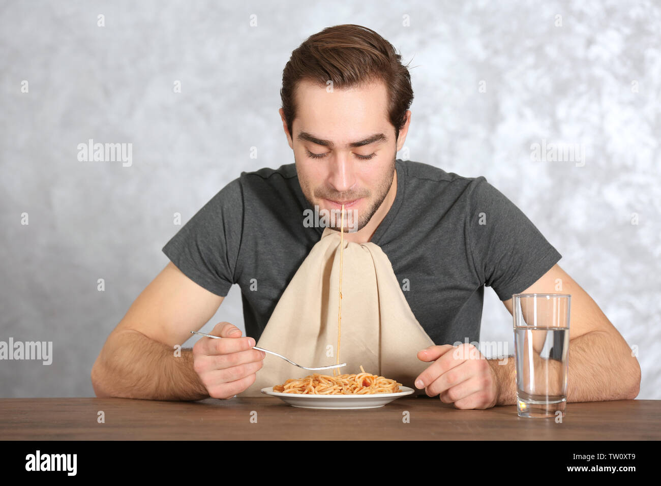 Man eating table hi-res stock photography and images - Alamy