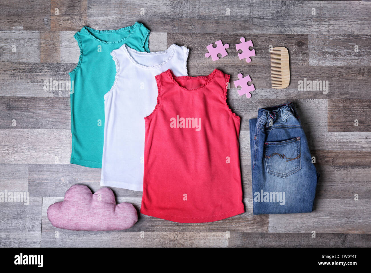 Baby clothes and accessories on wooden background Stock Photo - Alamy