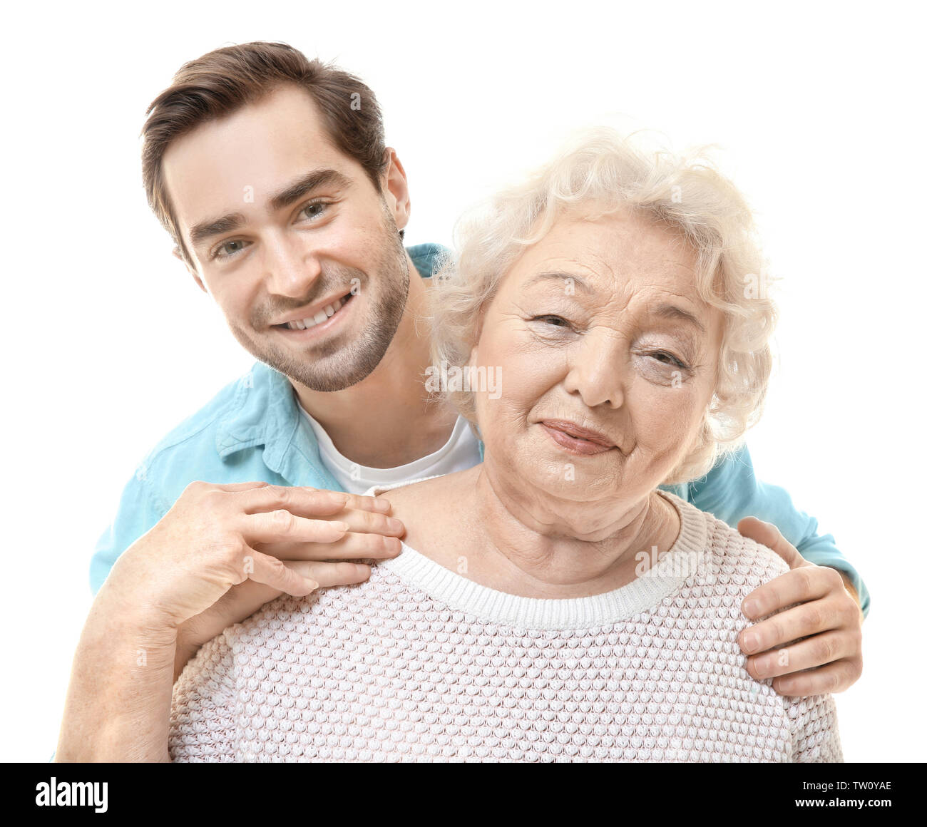 Young man with grandmother on white background Stock Photo - Alamy