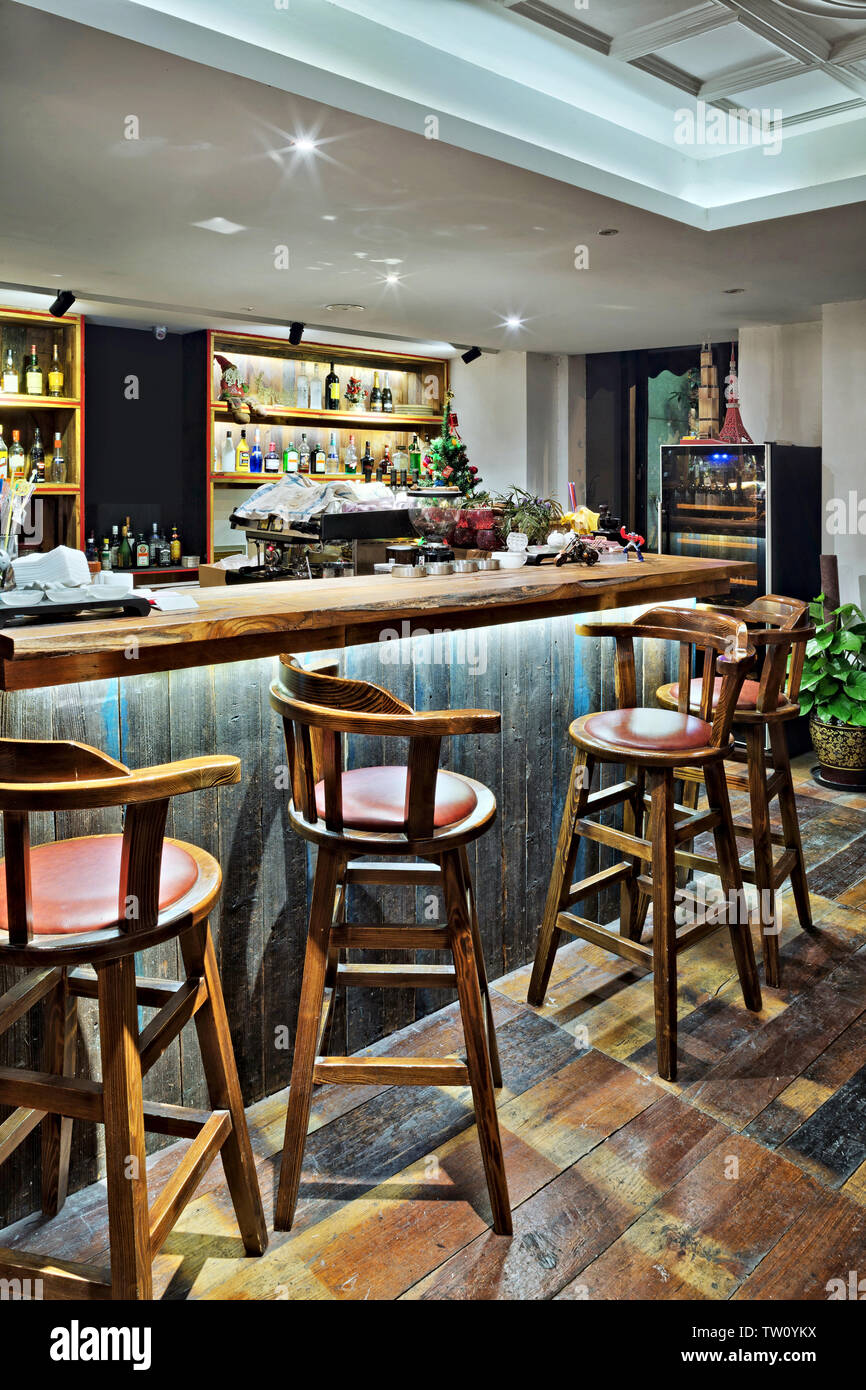bar counter with chairs in empty comfortable restaurant Stock Photo - Alamy