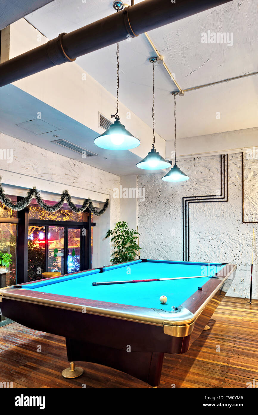Contemporary interior, living room with a snooker table Stock Photo - Alamy