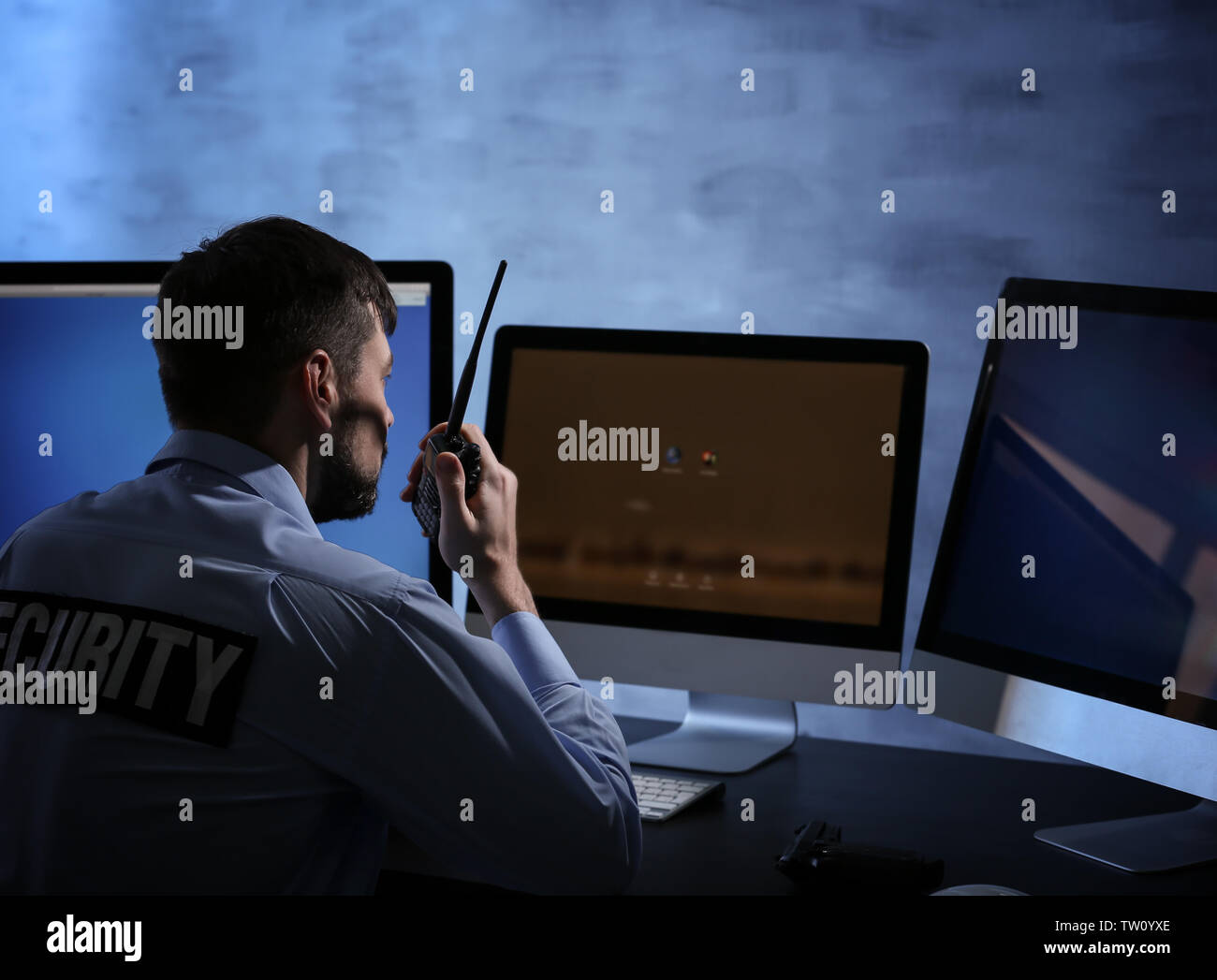 Male security guard on workplace Stock Photo - Alamy
