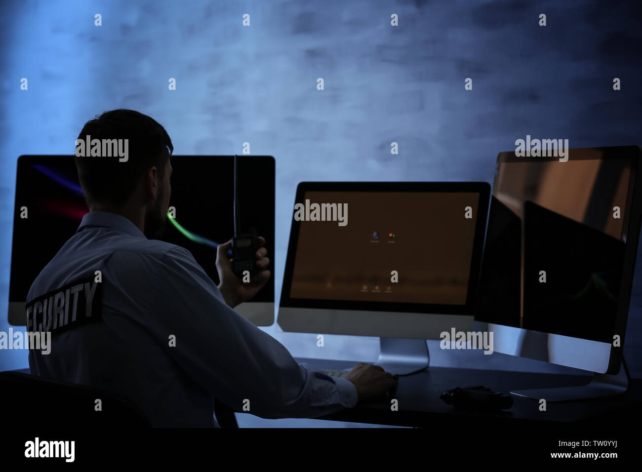 Male security guard on workplace Stock Photo - Alamy