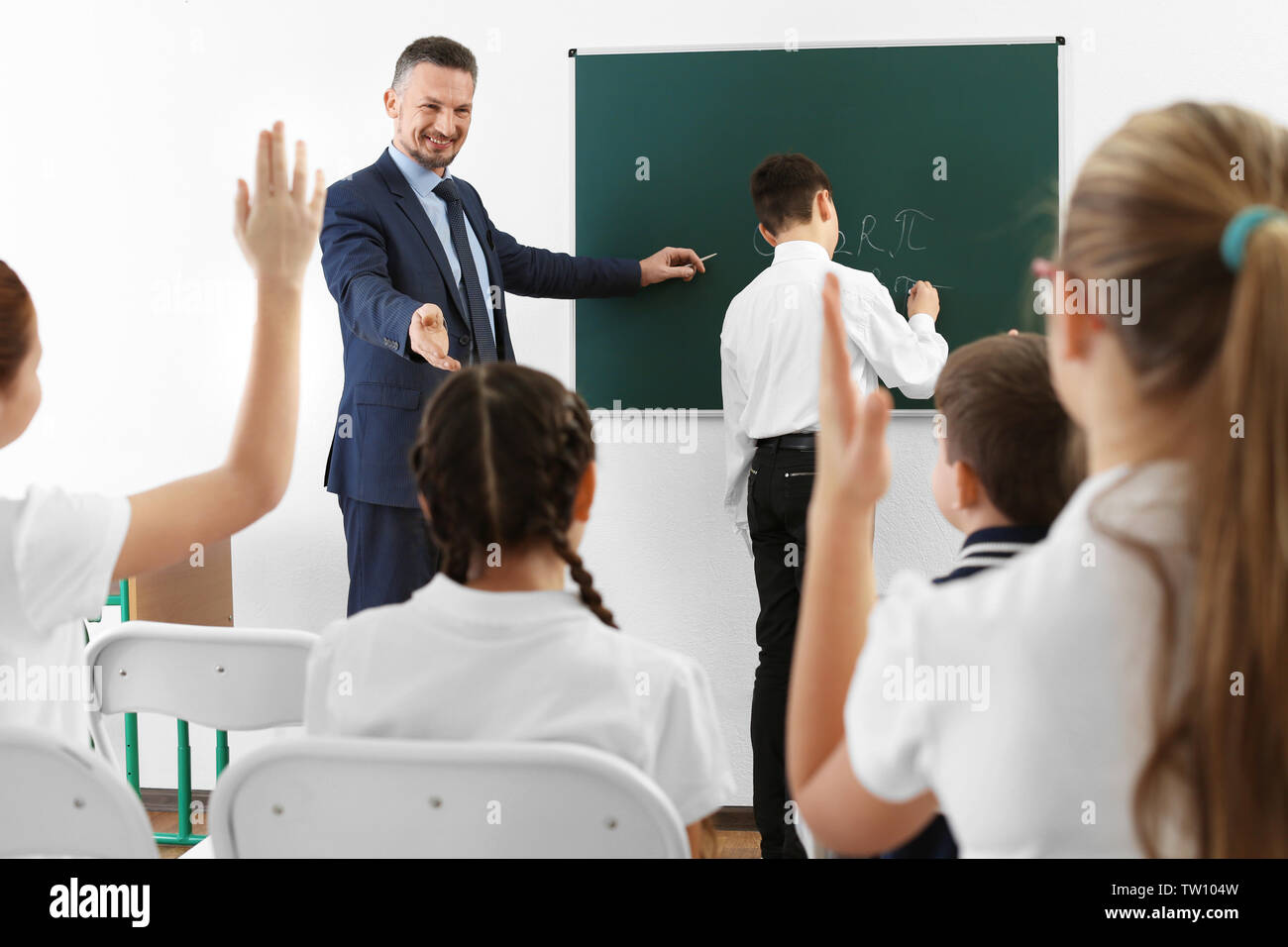 Classroom kids learning geometry hi-res stock photography and images ...