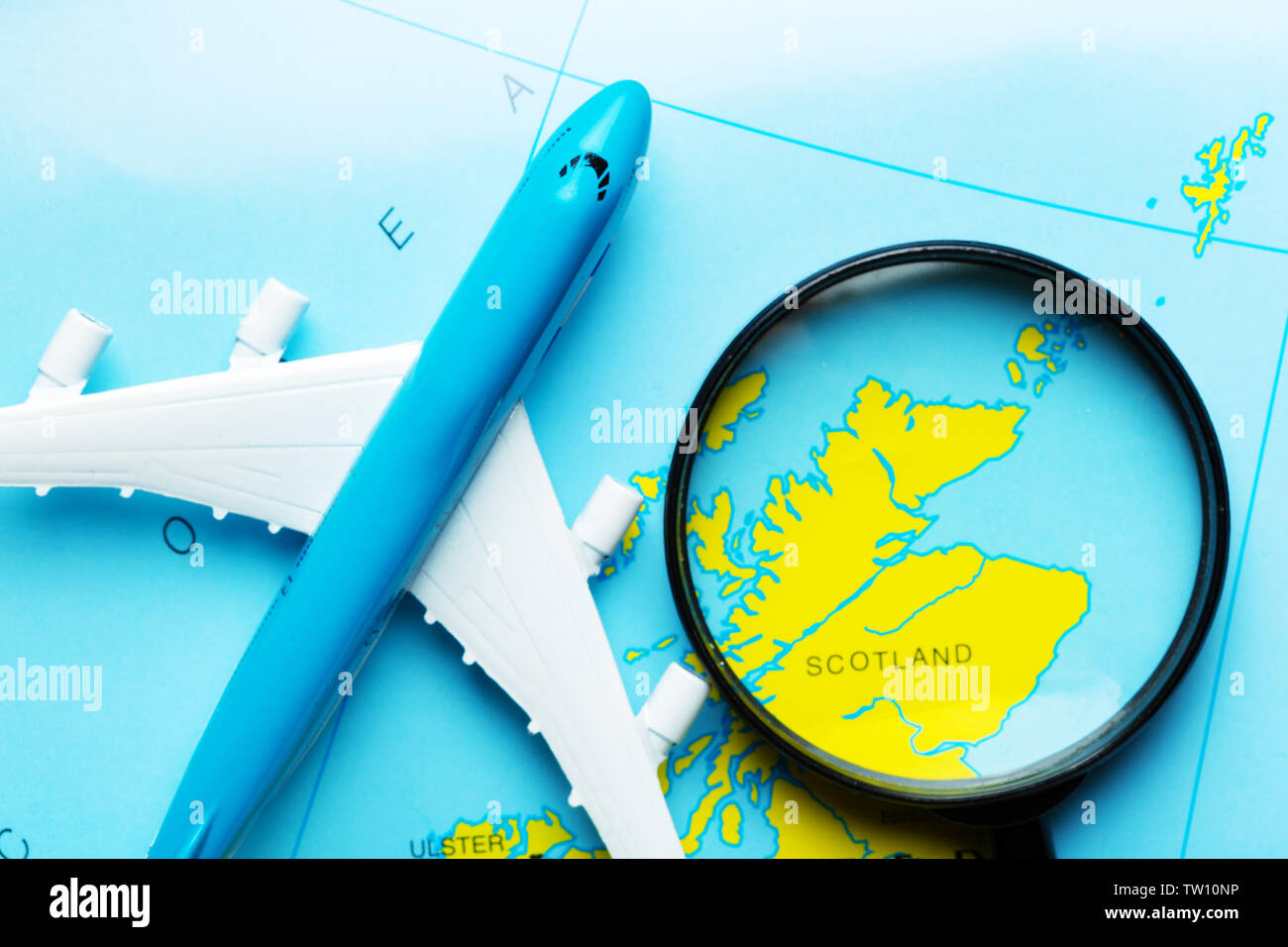 Magnifying glass and map Stock Photo - Alamy