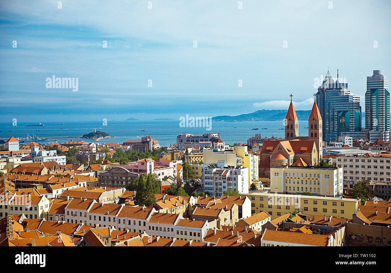 Qingdao red tile green trees blue sea blue sky hi-res stock photography ...