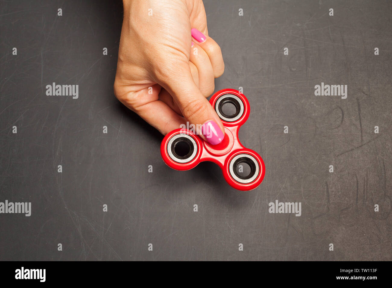 Light blue fidget spinner hi-res stock photography and images - Alamy