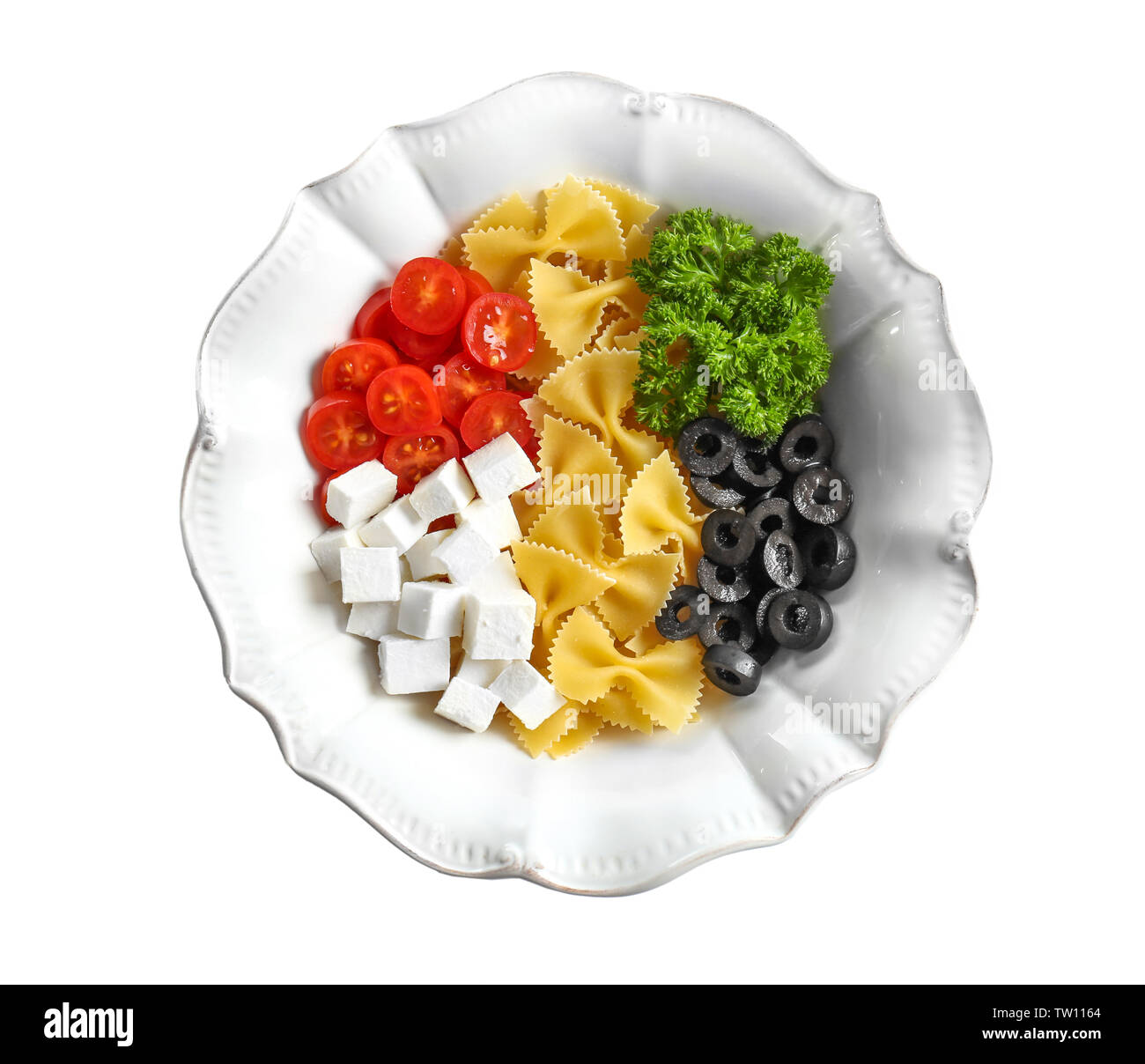Plate with ingredients on white background Stock Photo - Alamy