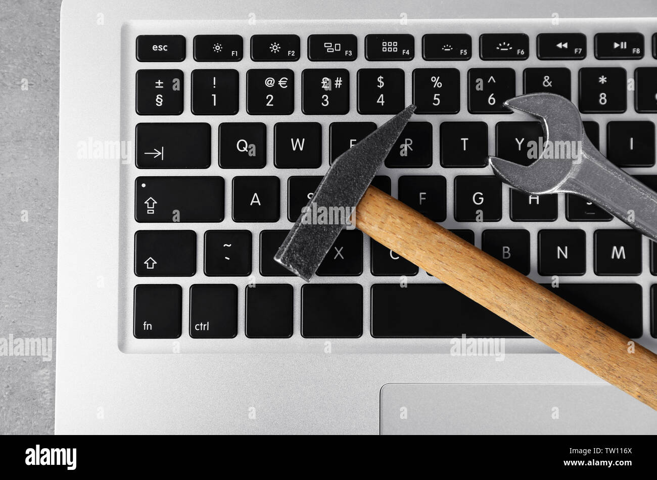 Instruments on laptop keyboard, closeup Stock Photo - Alamy