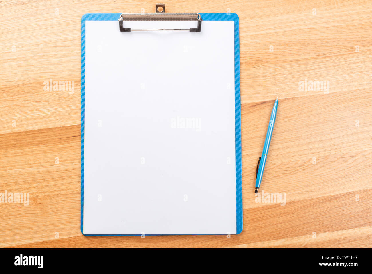 Office clipboard on the table close up Stock Photo - Alamy