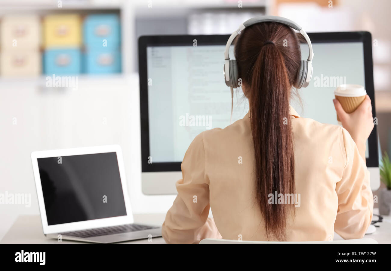 Woman programmer working at office Stock Photo - Alamy