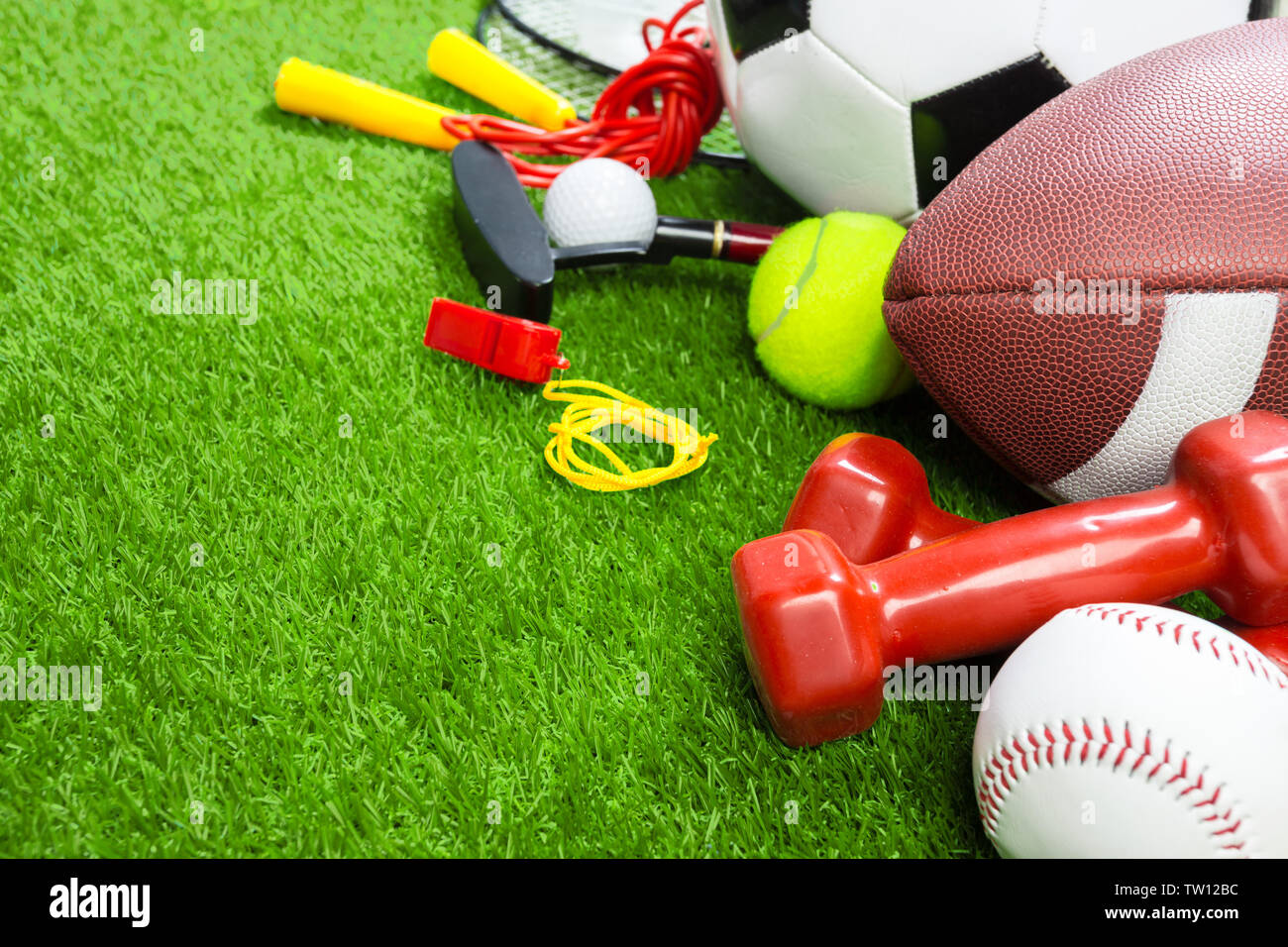 Various sport tools on grass Stock Photo - Alamy