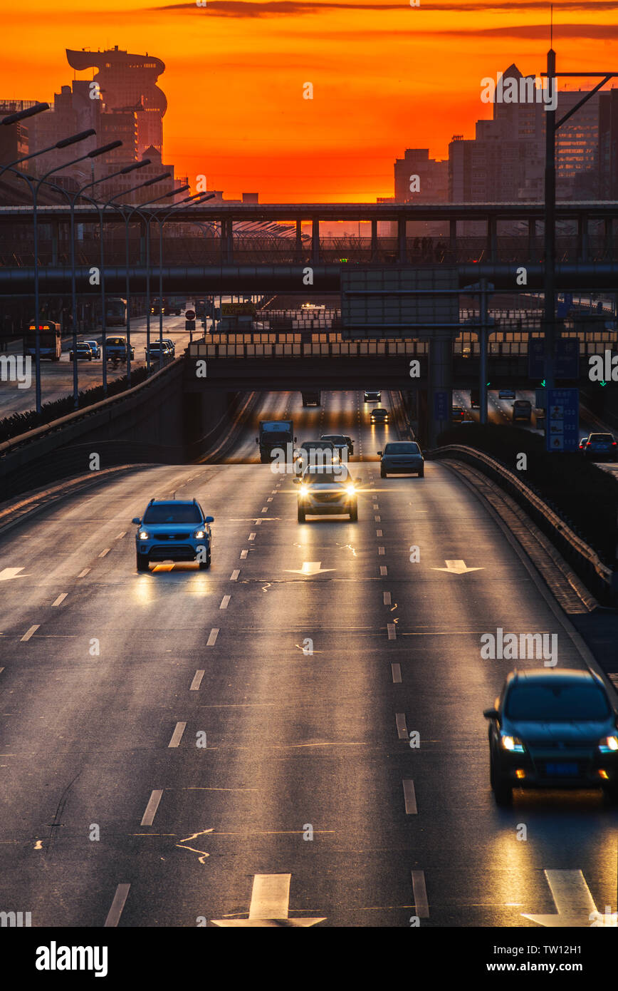 Traffic flow at sunrise in Beijing Northern Fourth Ring Stock Photo - Alamy