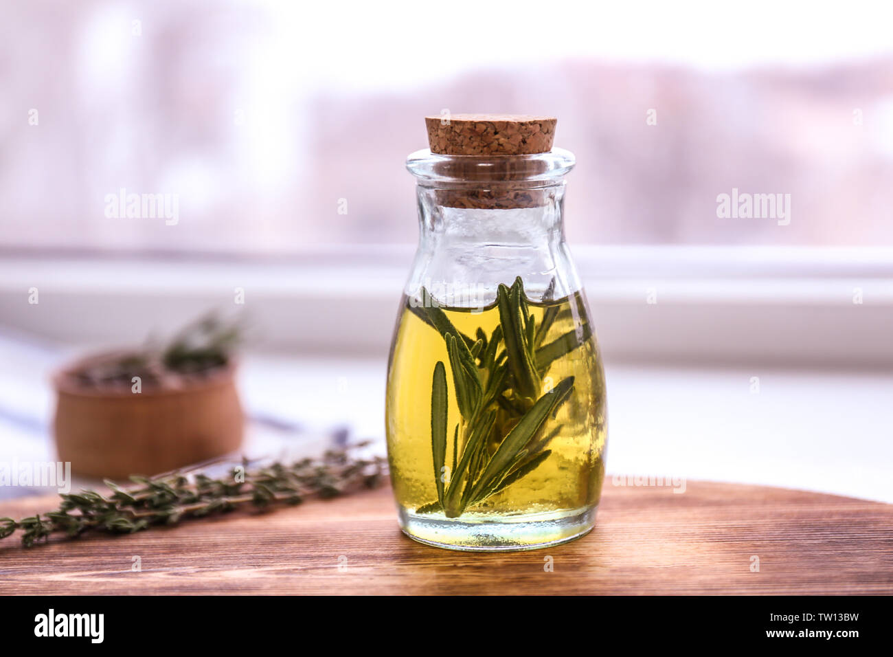 Bottle with oil, closeup Stock Photo - Alamy