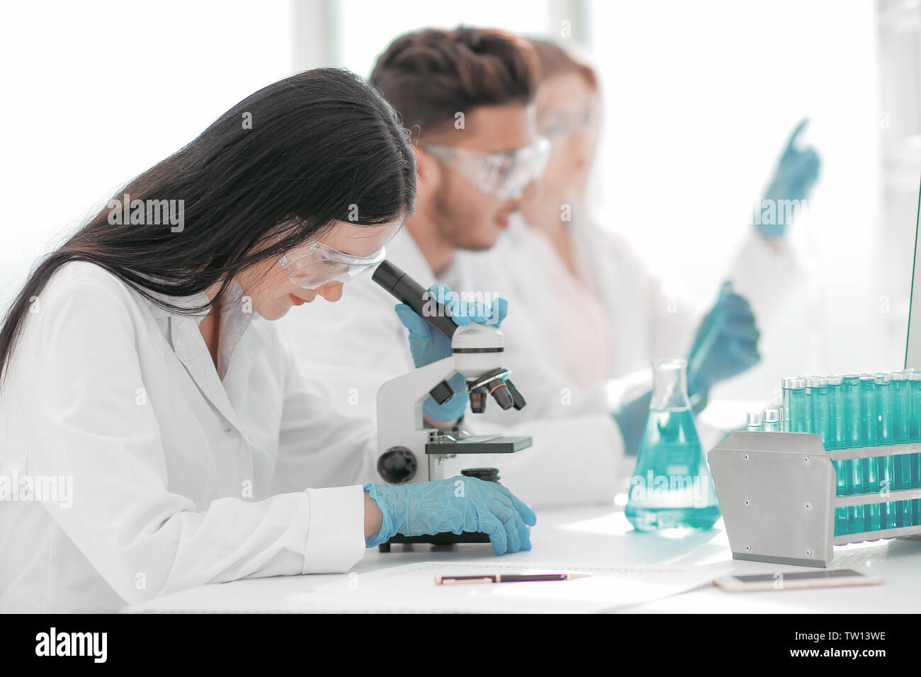 close up.scientists and laboratory workers sitting at the laboratory ...