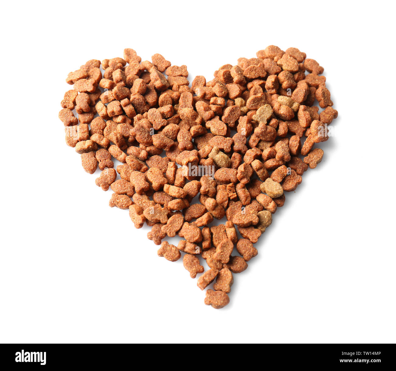 Heart shape made of dry food for animals on white background Stock ...