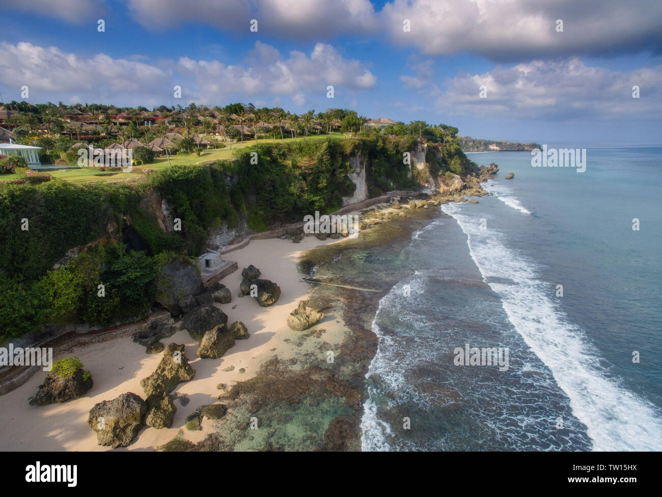 Bali blue sky and white clouds under Indian Ocean resort hotel waves ...