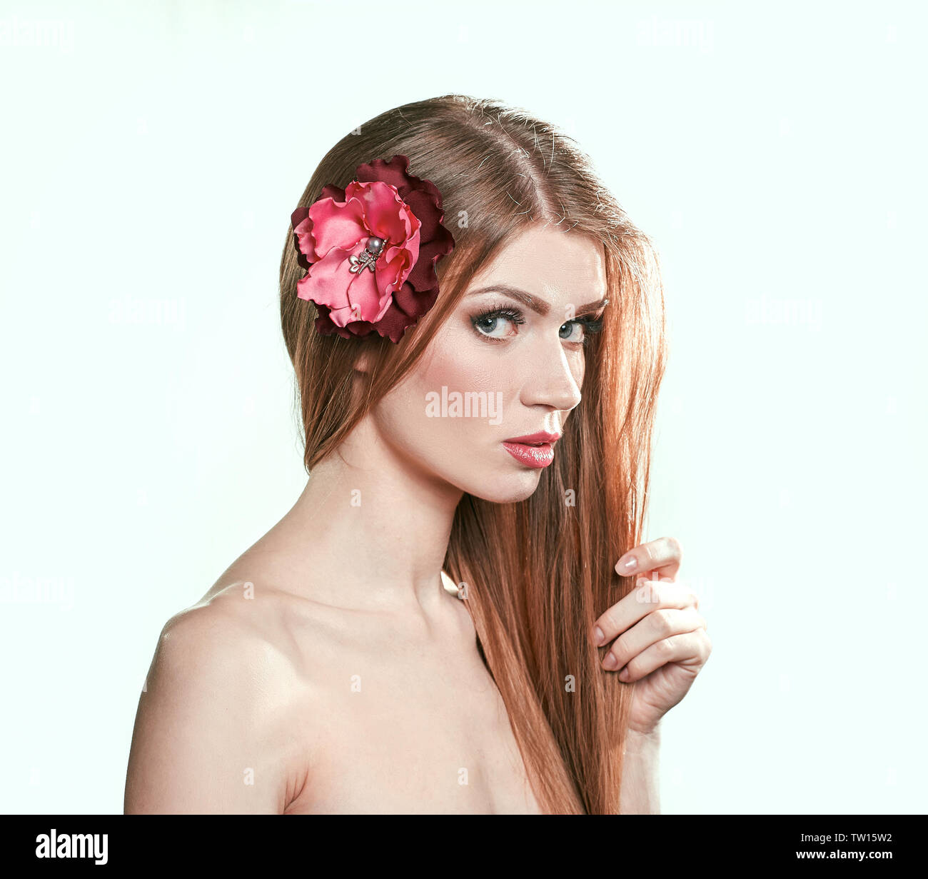 portrait of cute girl with long hair .isolated on light background ...