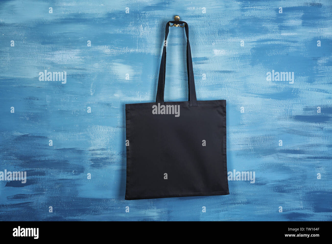 Shopping bag hanging on hi-res stock photography and images - Alamy