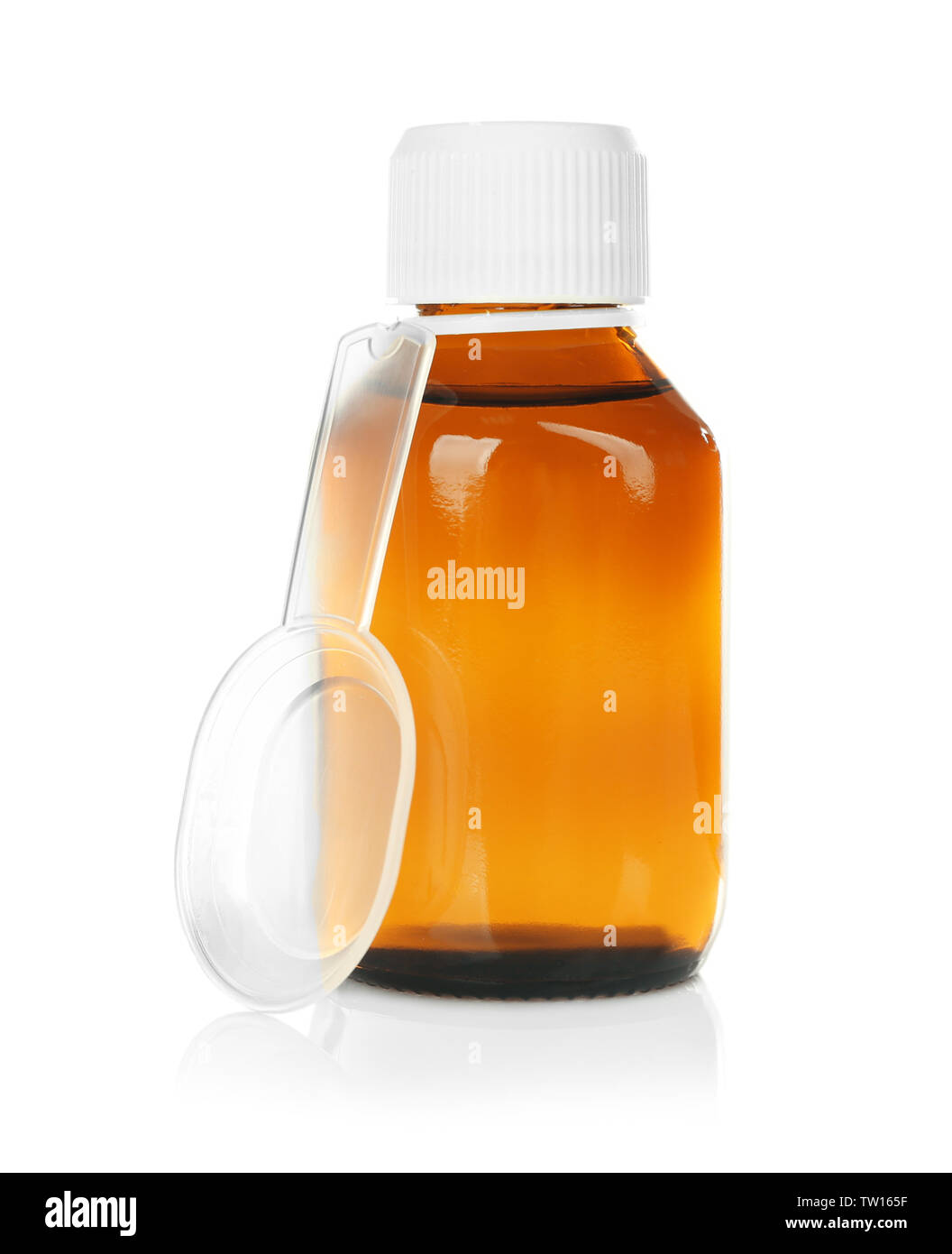 Bottle with cough medicine syrup and measuring spoon isolated on white ...