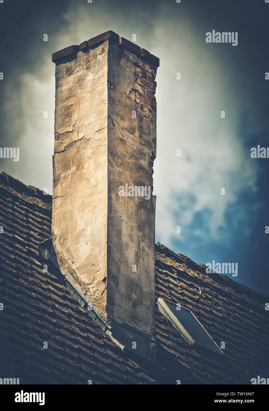 The old abandoned chimney in a dark setting Stock Photo - Alamy