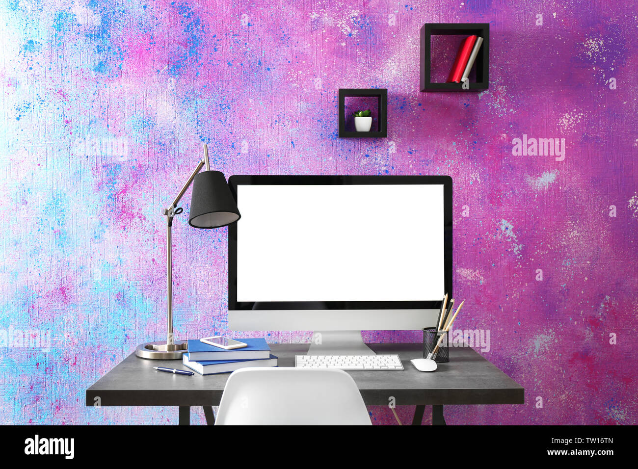 Workplace with computer on table in modern room Stock Photo - Alamy