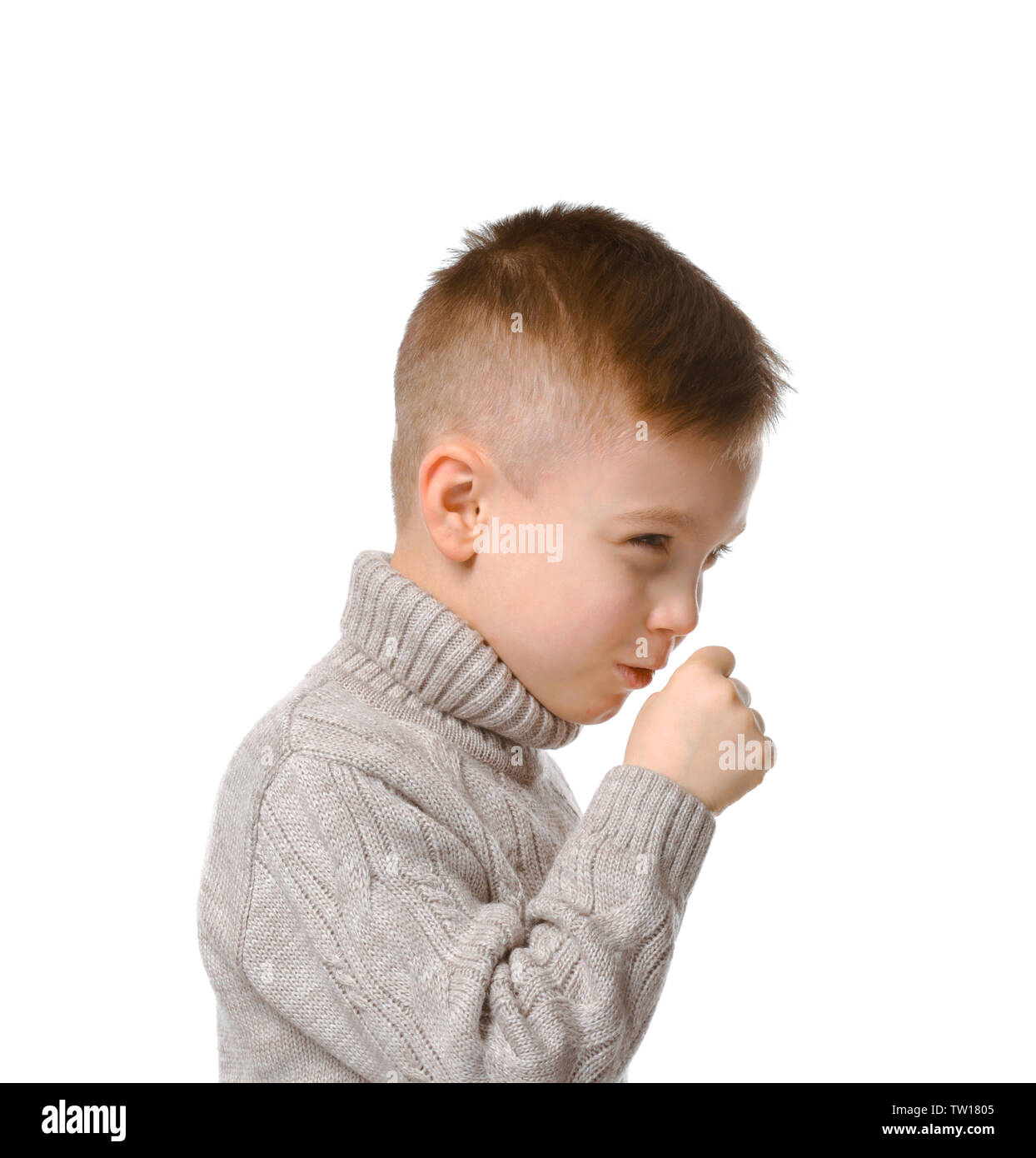 Cute little boy coughing on white background Stock Photo - Alamy