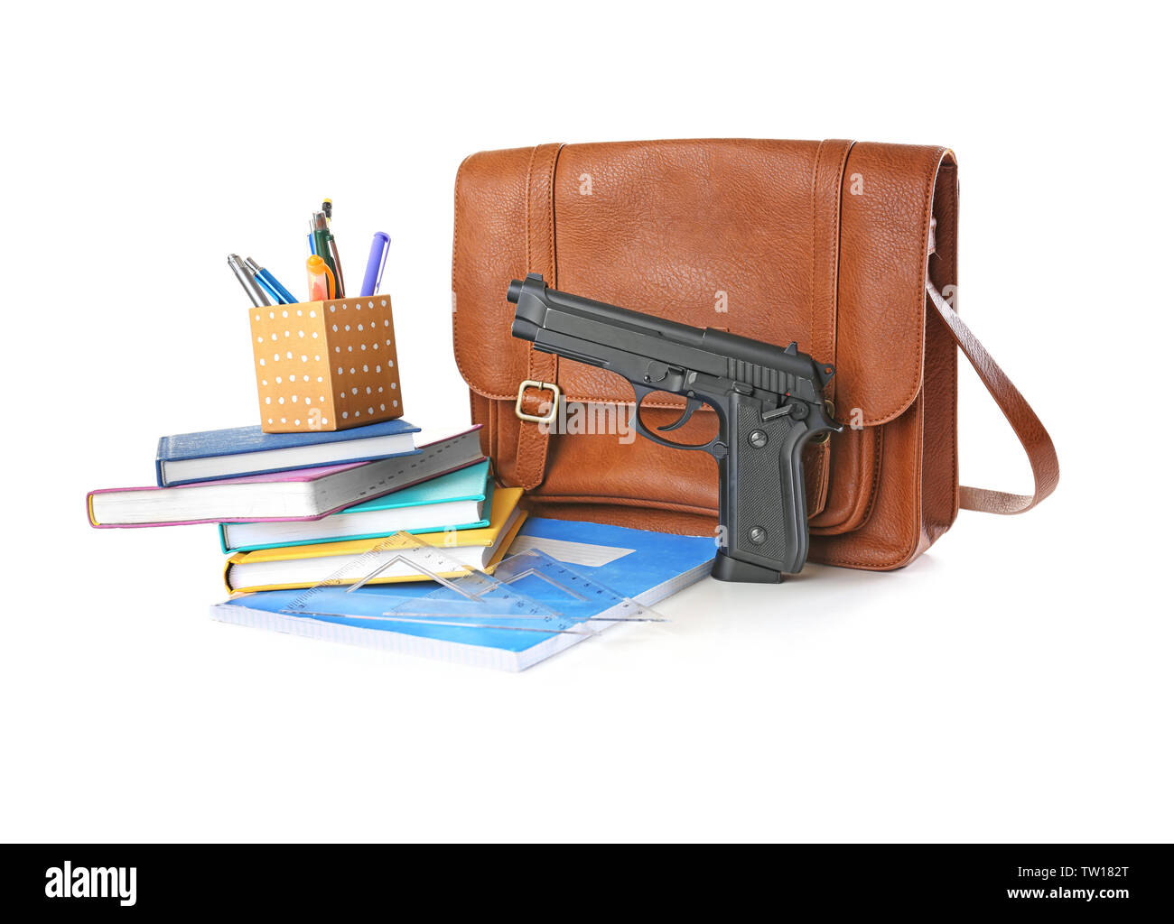 School stationery and gun isolated on white Stock Photo - Alamy